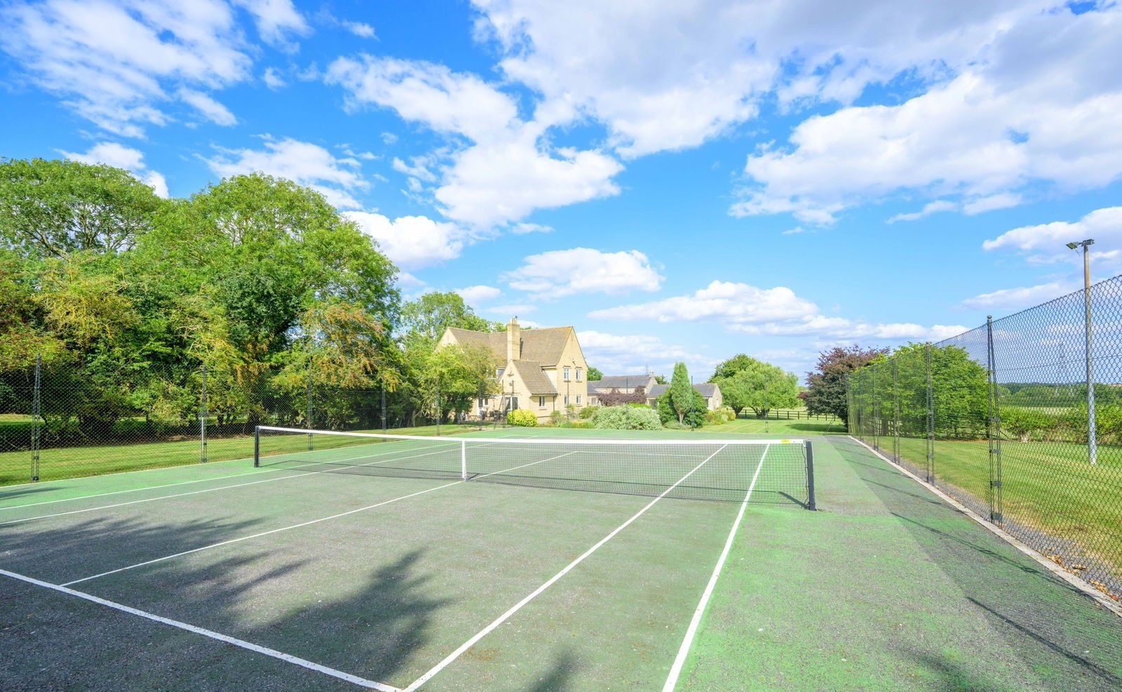 Homes with tennis courts for Wimbledon | Fine & Country