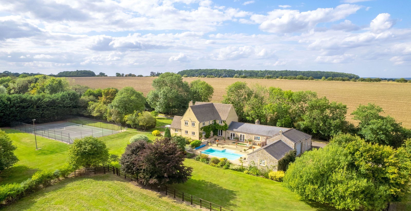 Homes with tennis courts for Wimbledon | Fine & Country